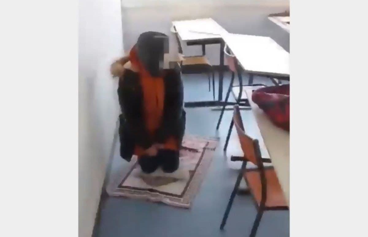 Video of a veiled student praying inside a university sparks ...