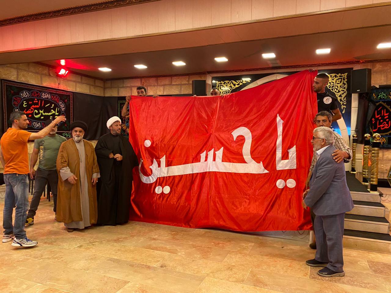 Imam Hussein Media Group gifts banner of Imam Hussein to Shia loyalists ...